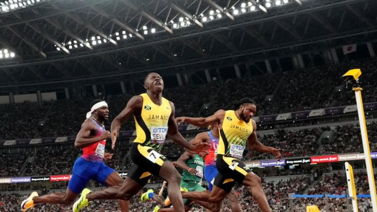 Oblique Seville storms to 100m world title in Tokyo as Jamaica takes 1 ...